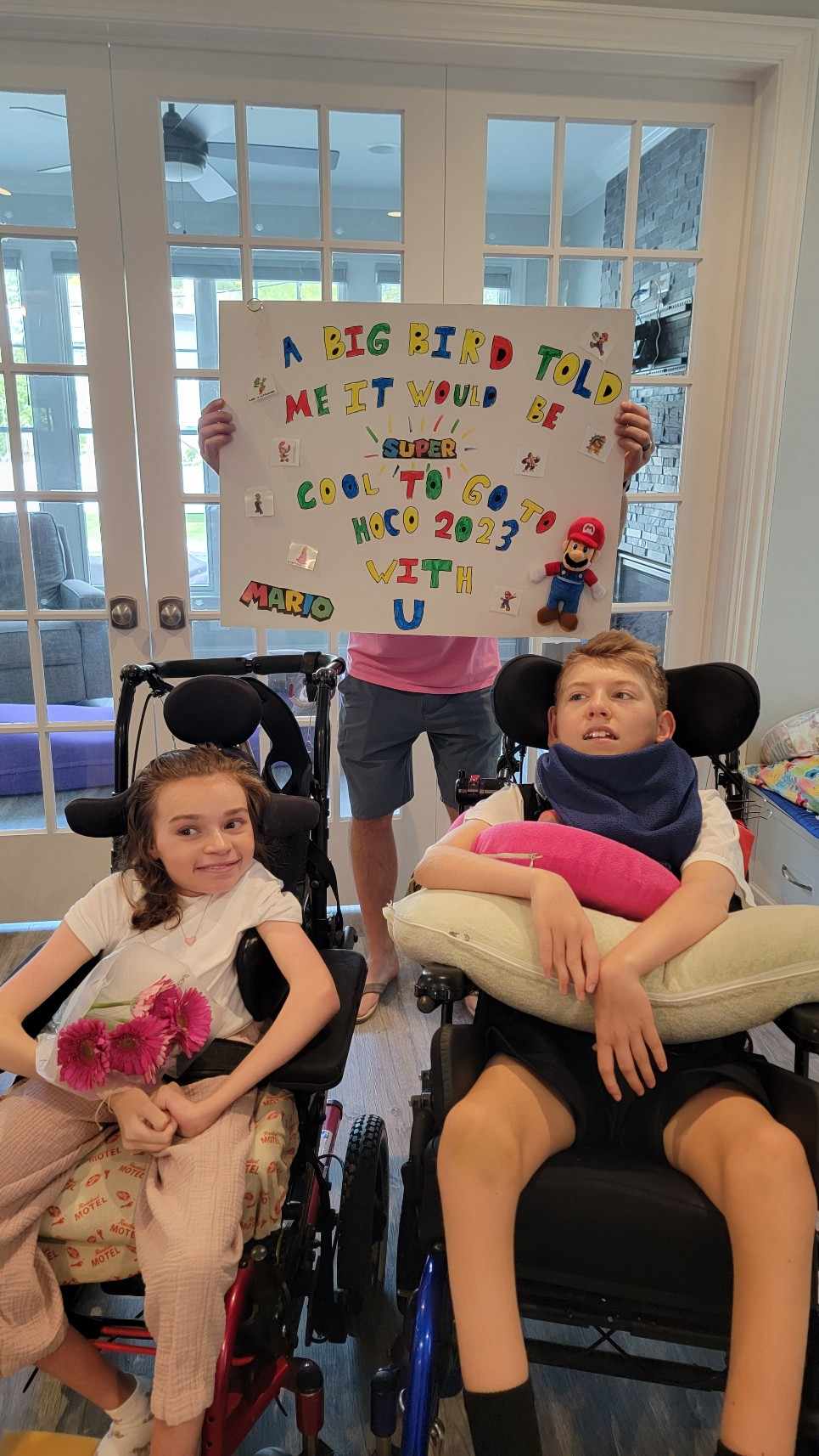 Two special needs families share in the joy of a homecoming proposal ...
